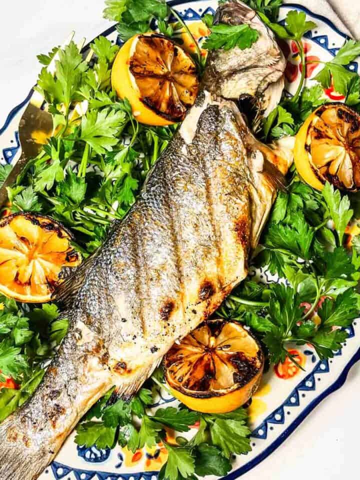 Grilled Lemon Fish with Garlic Butter Sauce - Meghan It Up