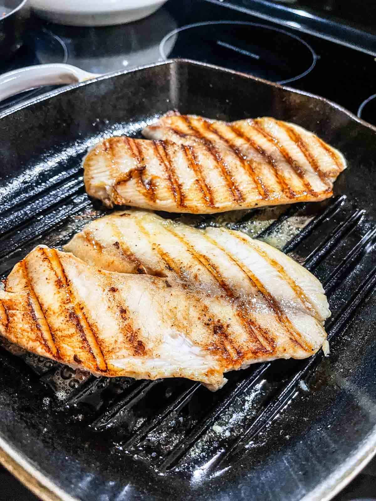 Grilled Lemon Fish with Garlic Butter Sauce - Meghan It Up
